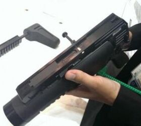 DSEi 13: STK Airburst 40mm Under Barrel Grenade Launcher ...