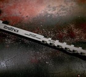 EraThr3/AXTS Titanium Ported AR Charging Handle | thefirearmblog.com