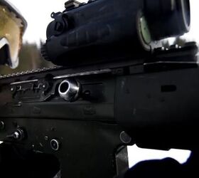 Swedish Arctic Rangers fighting from snowmobiles | thefirearmblog.com