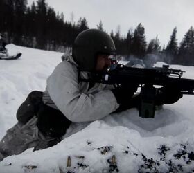 Swedish Arctic Rangers fighting from snowmobiles | thefirearmblog.com