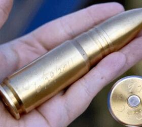 Machine Gun Shoot Ricochet – .950 JDJ Into Man's Leg | thefirearmblog.com