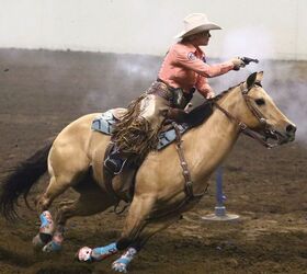 Cowboy Shooting On Horse