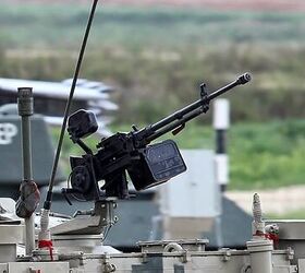 DShK Heavy Machine Gun Mounted on Motorcycle Rear Seat | thefirearmblog.com