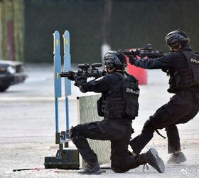 Chinese SWAT with Modded Type 79 Submachine Guns | thefirearmblog.com